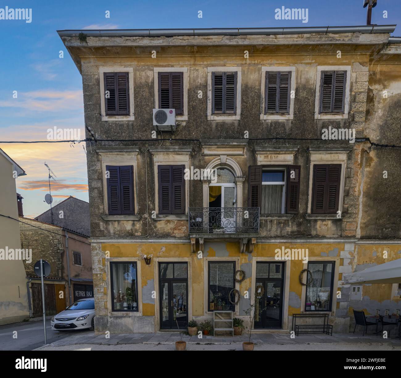View of an old multi-storey apartment building in need of renovation ...