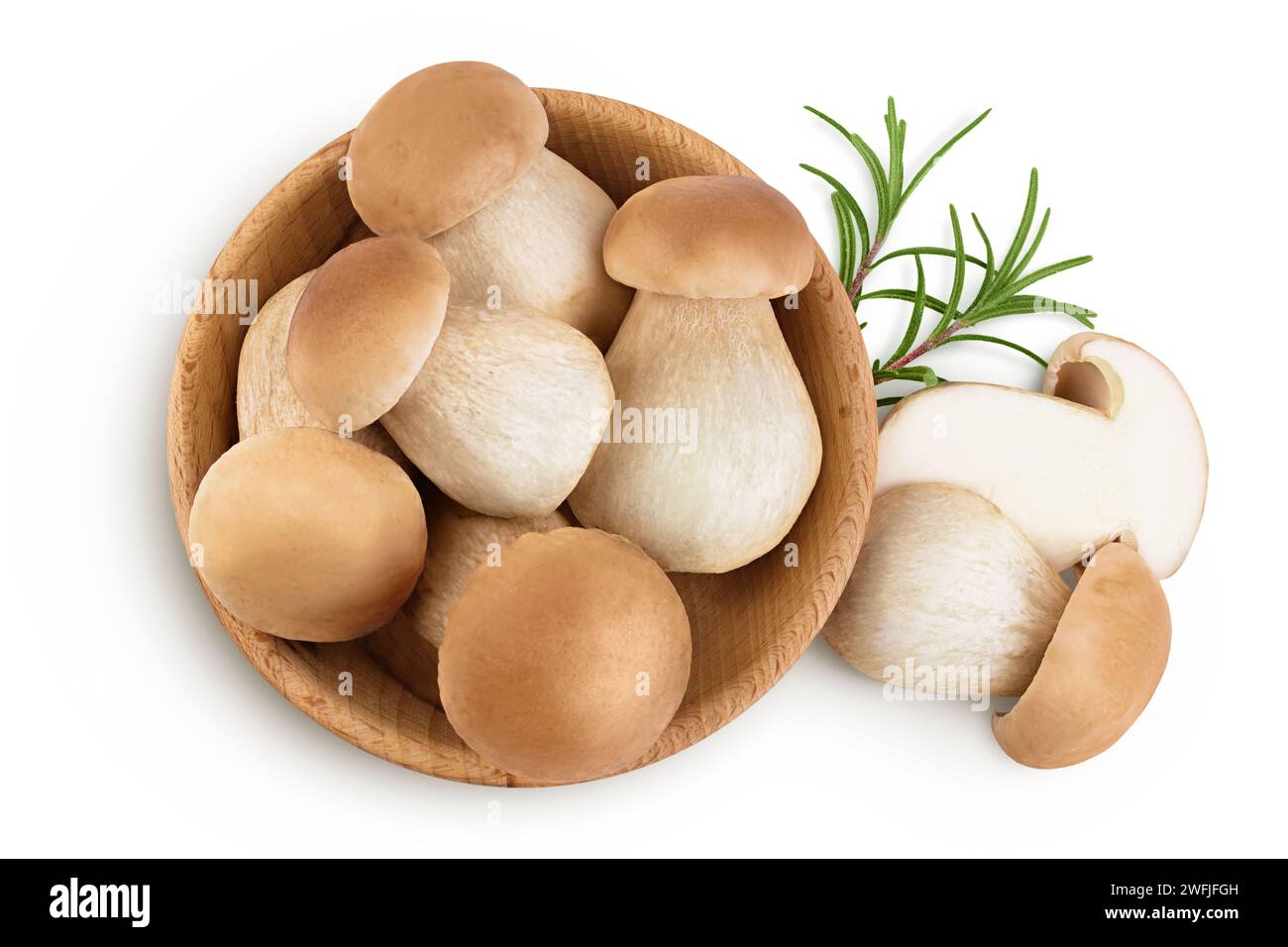 Fresh porcini cep mushroom isolated on white background in wooden bowl ...