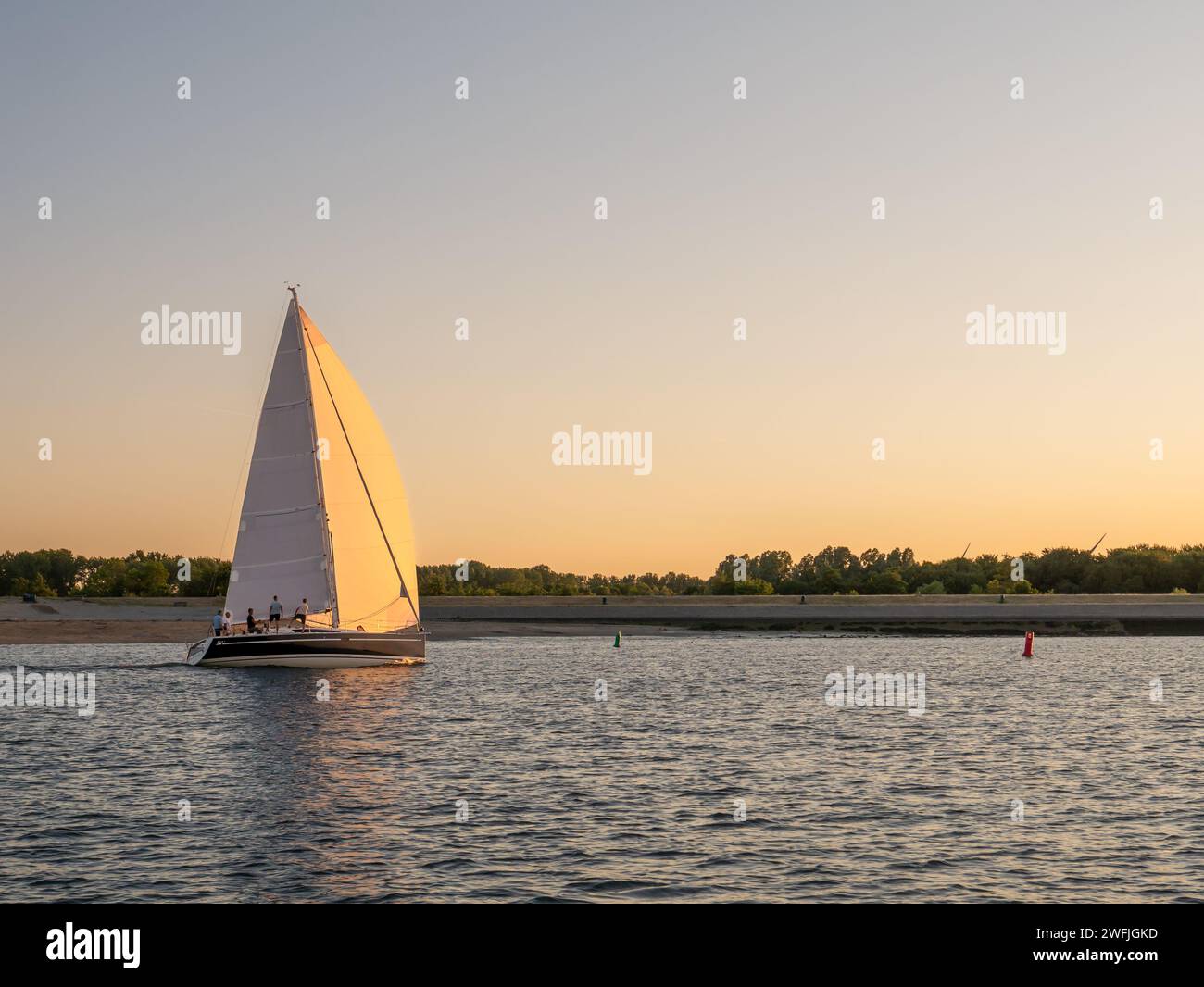 People sailing on sailboat on Krabbenkreek inlet between Tholen and ...