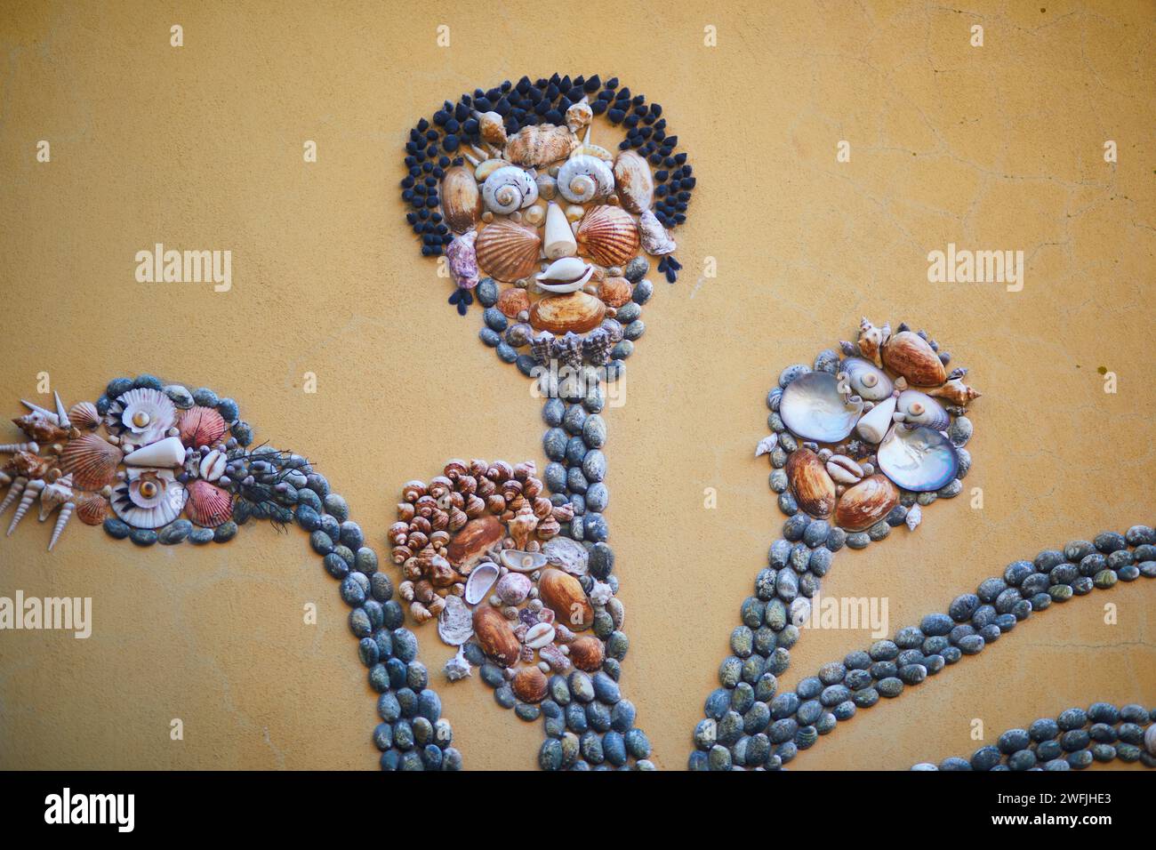 Beautiful art decorations made from shells and pebbles on walls in Ile ...