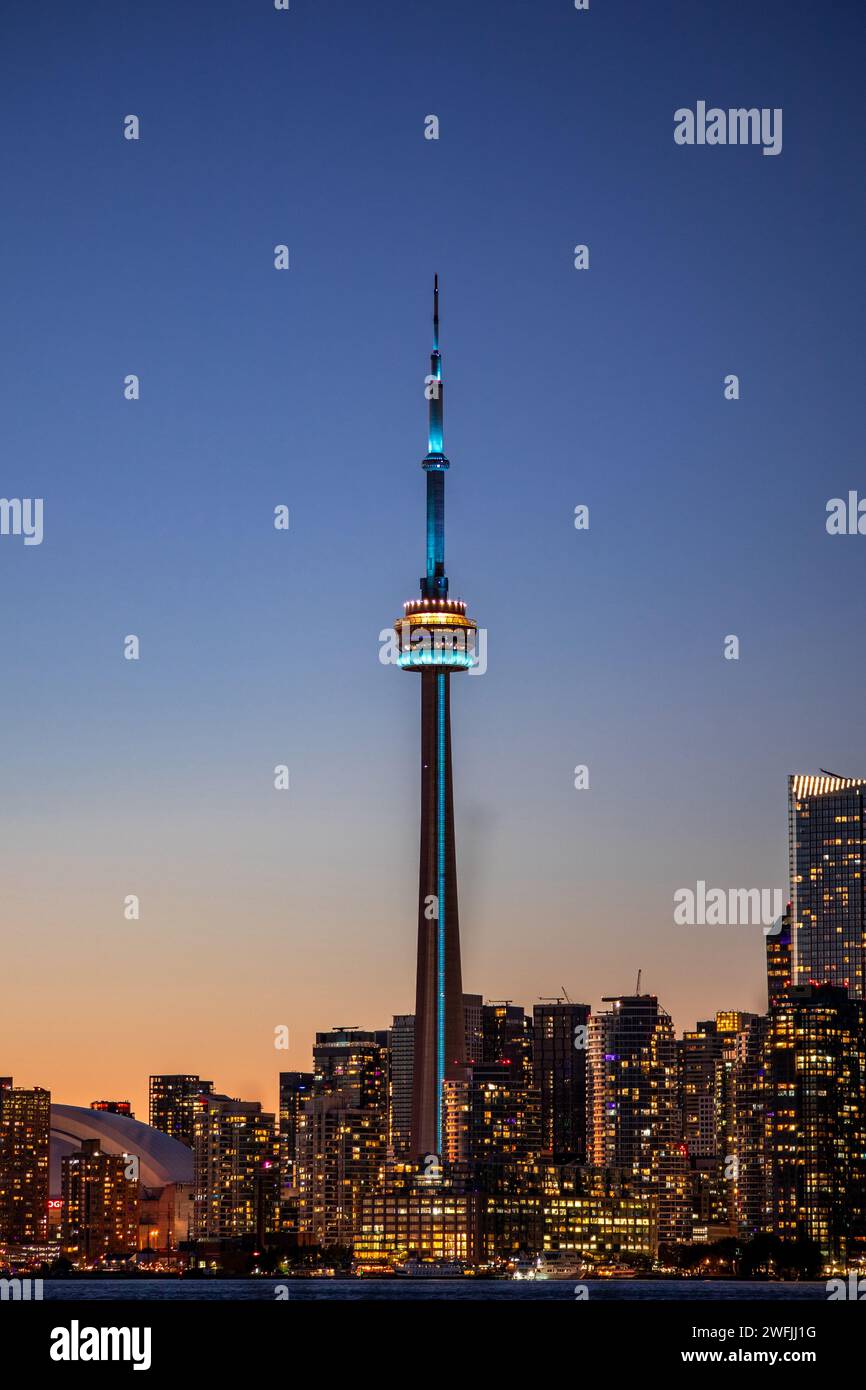 Toronto skyline focusing on the CN Tower during the sunset - Toronto ...