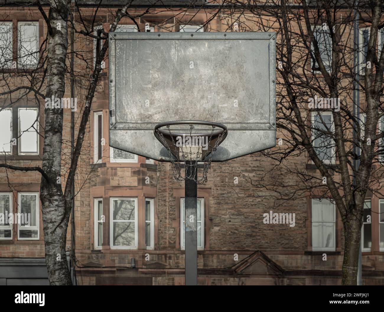 Edinburgh, Scotland, Jan 19, 2024 - Steel basketball backboard with the hoop metal ring and ...