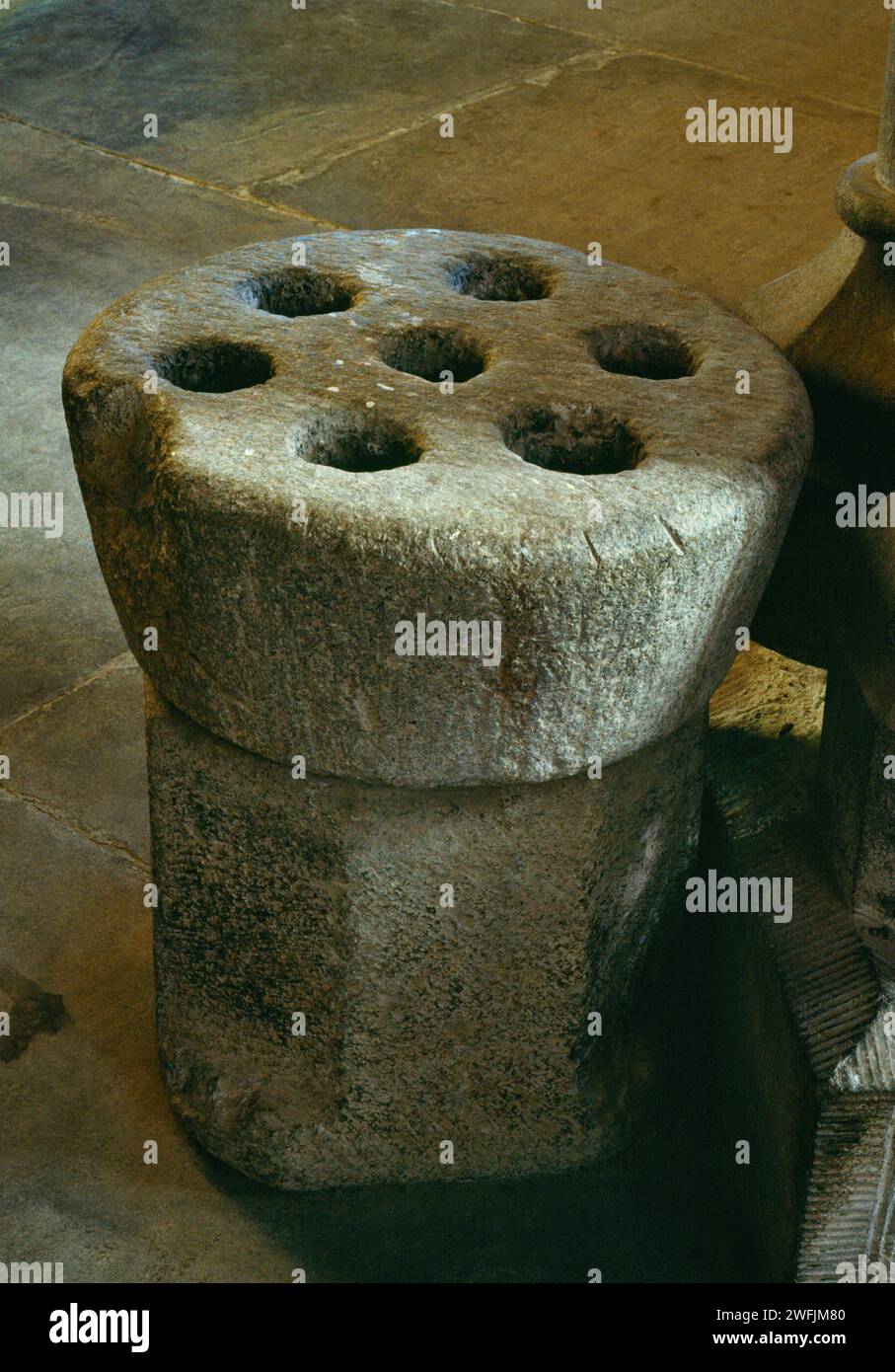 A Medieval cresset stone lamp with 7 cups for tallow & wicks in ...