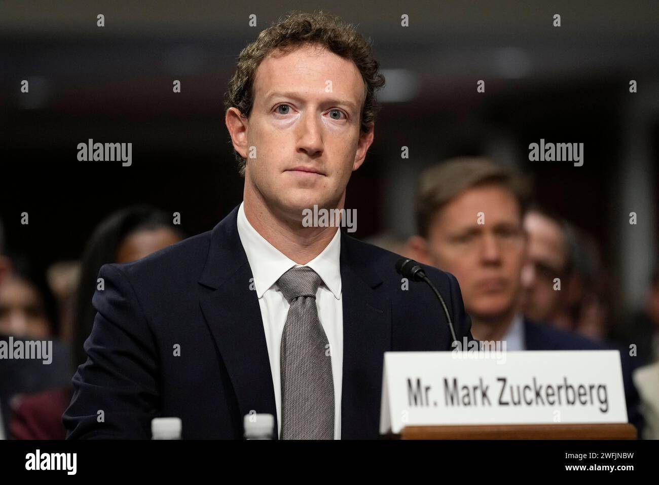 Meta CEO Mark Zuckerberg listens during a Senate Judiciary Committee ...