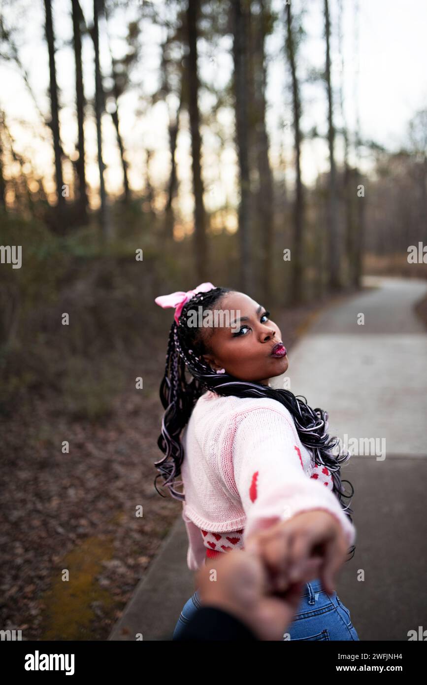 Iambellarayne, Bella Rayne, model, walking down a path in a romantic ...