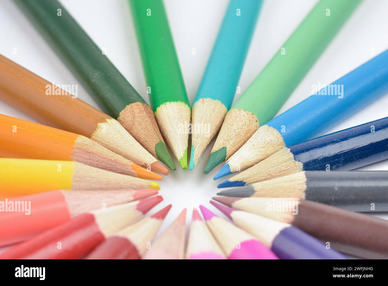 Seamless bright coloured pencils arranged in a circle. Colour spectrum ...