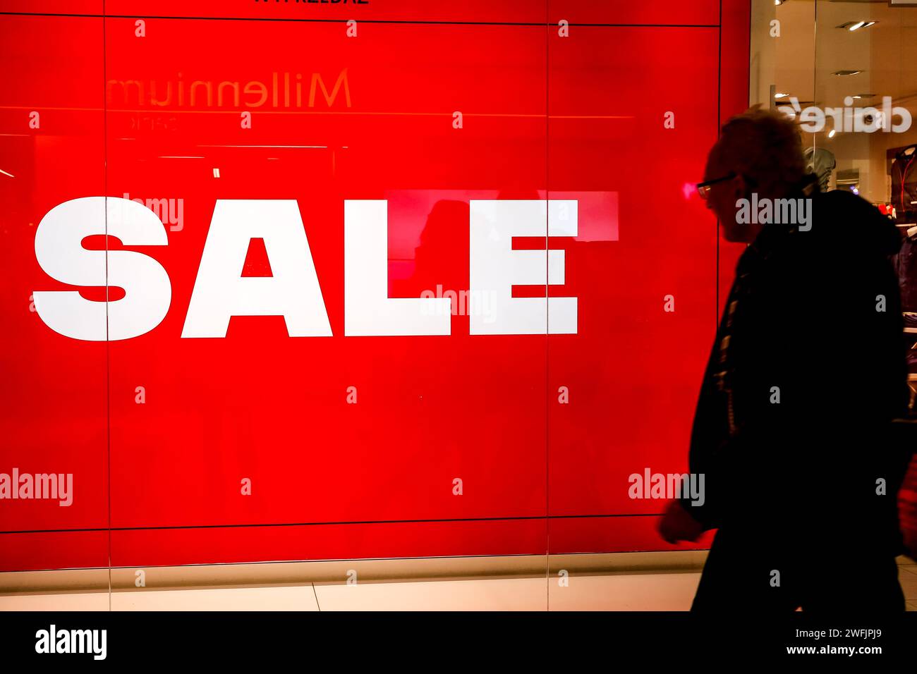 Krakow, Poland, 31st of January, 2024. A shopper walks in front of 4F ...
