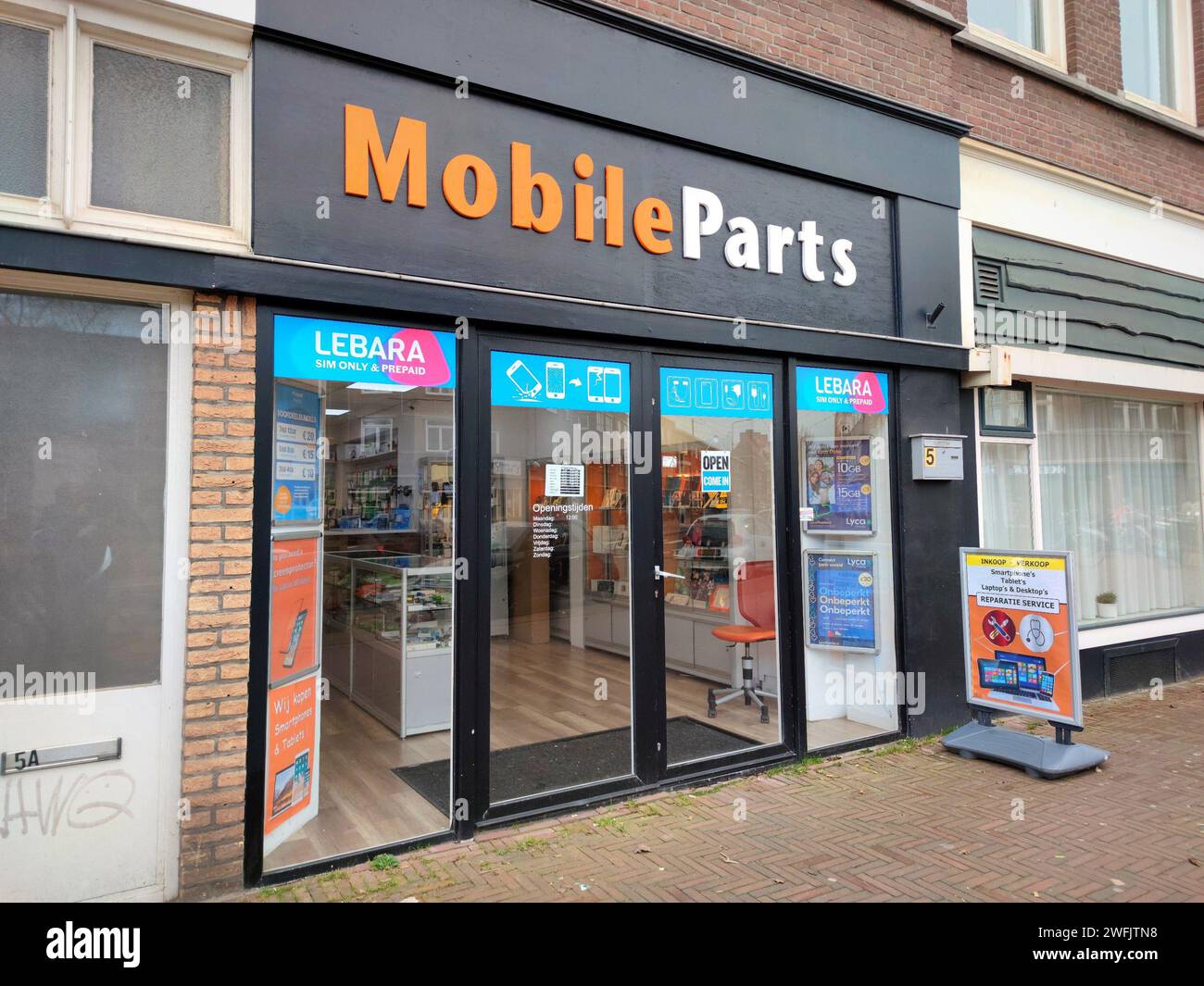 Cell phone parts and repair store in The Hague, Netherlands Stock Photo ...