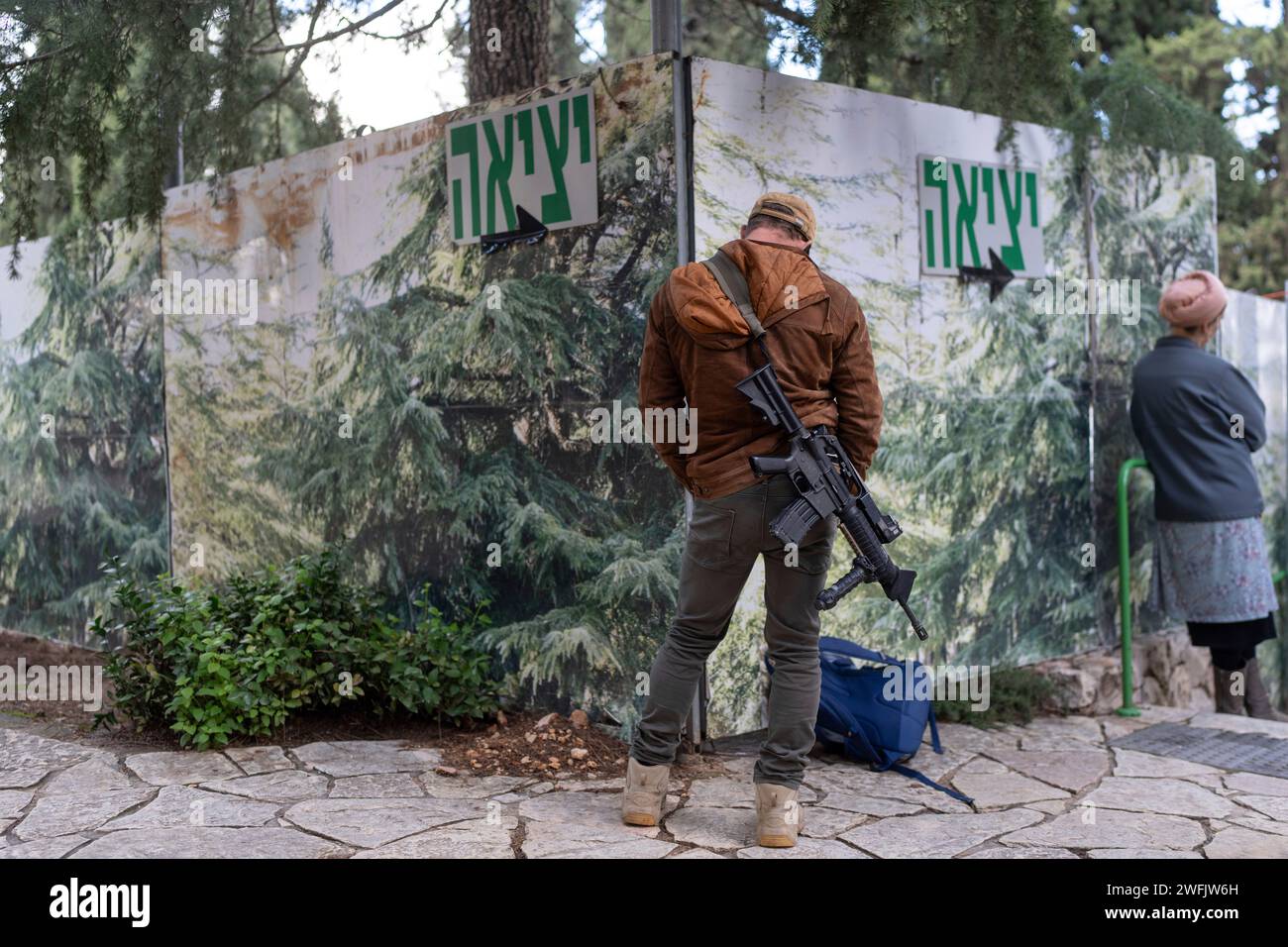 Mourners attend the funeral of reservist Gavriel Shani during his ...
