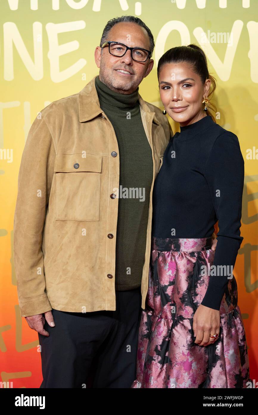 Bob Teitel, left, and Michelle Alegria pose for photographers upon ...
