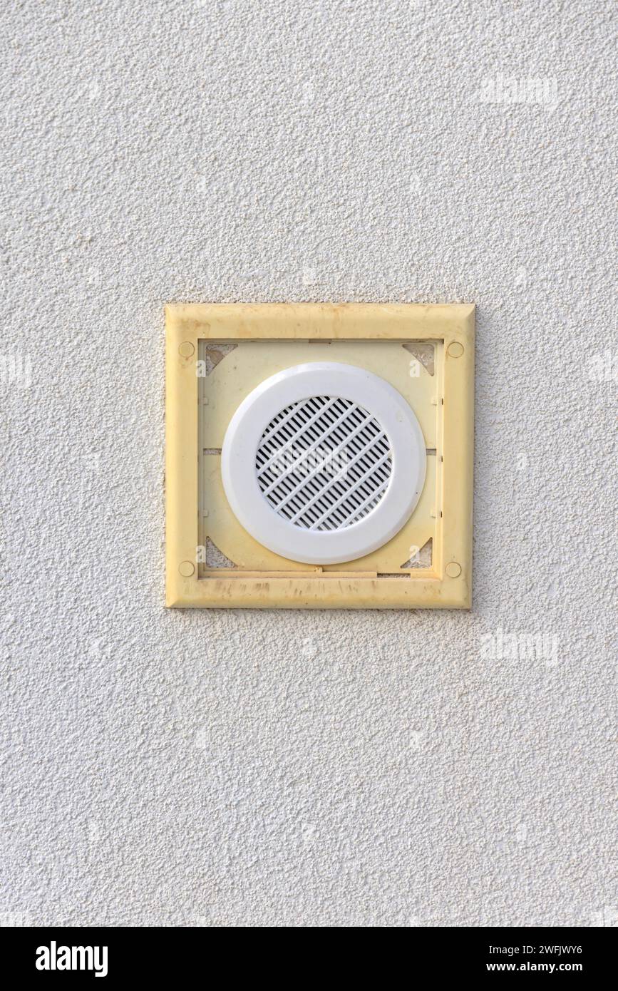 Plastic Cover Ventilation Outlet at White Wall House Stock Photo - Alamy