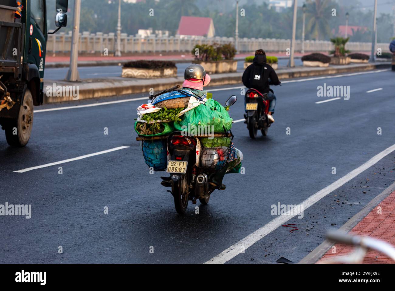Motorcycle transport in Vietnam Stock Photo - Alamy