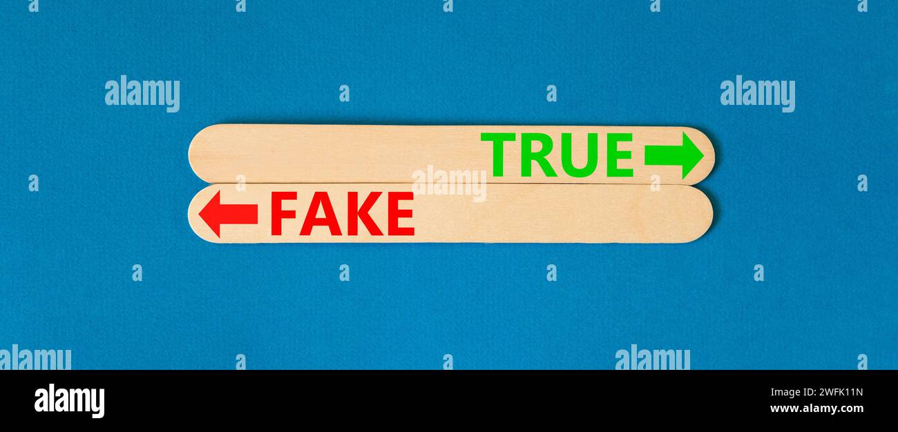 True or fake symbol. Concept word True or Fake on beautiful wooden ...