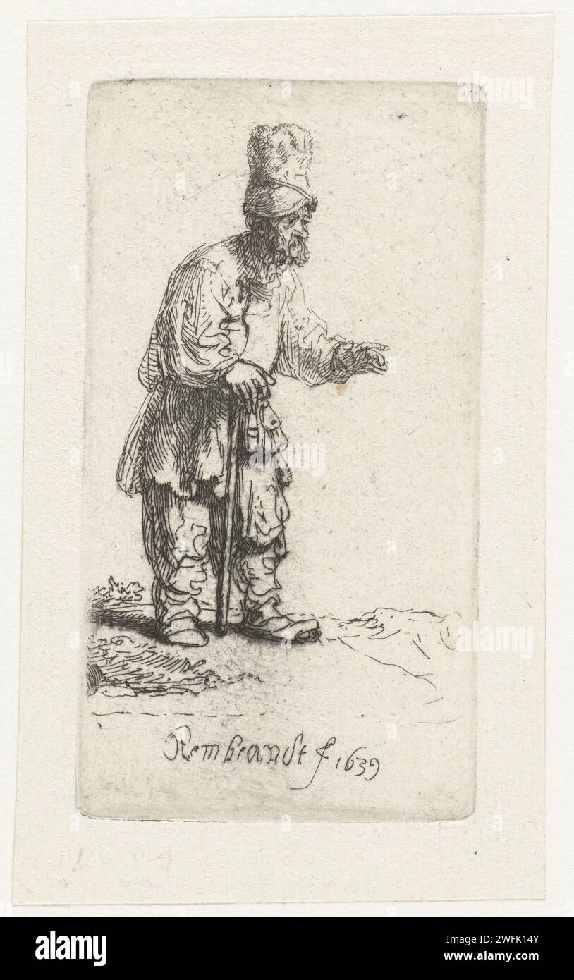 A peasant in a high cap, standing leaning on a stick, Rembrandt van ...