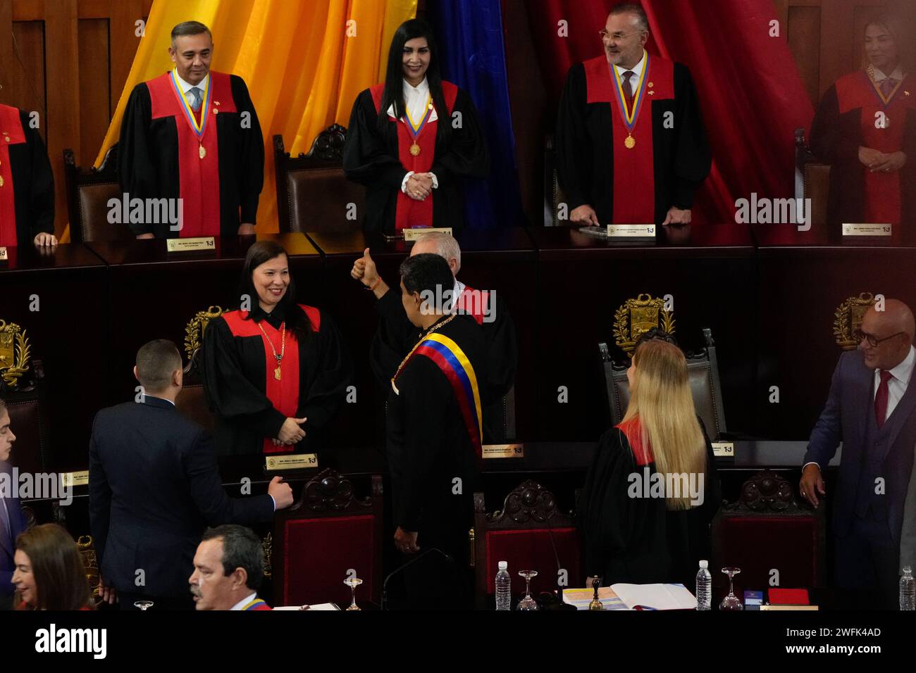 Venezuelan President Nicolas Maduro gives a thumbs up to Supreme Court ...