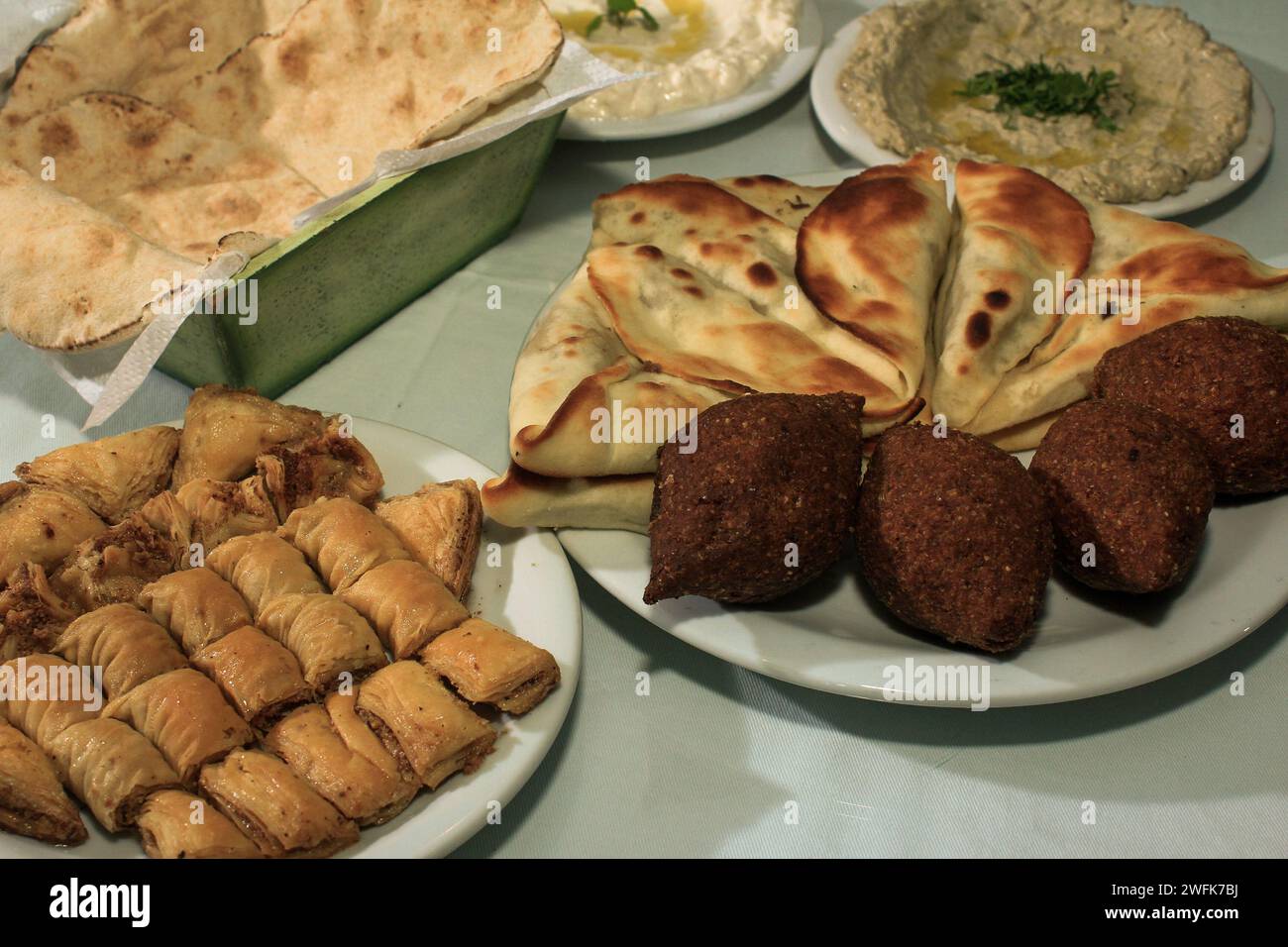 Typical dishes of Arab cuisine, Kafta, kibbeh, esfira, tabbouleh and ...