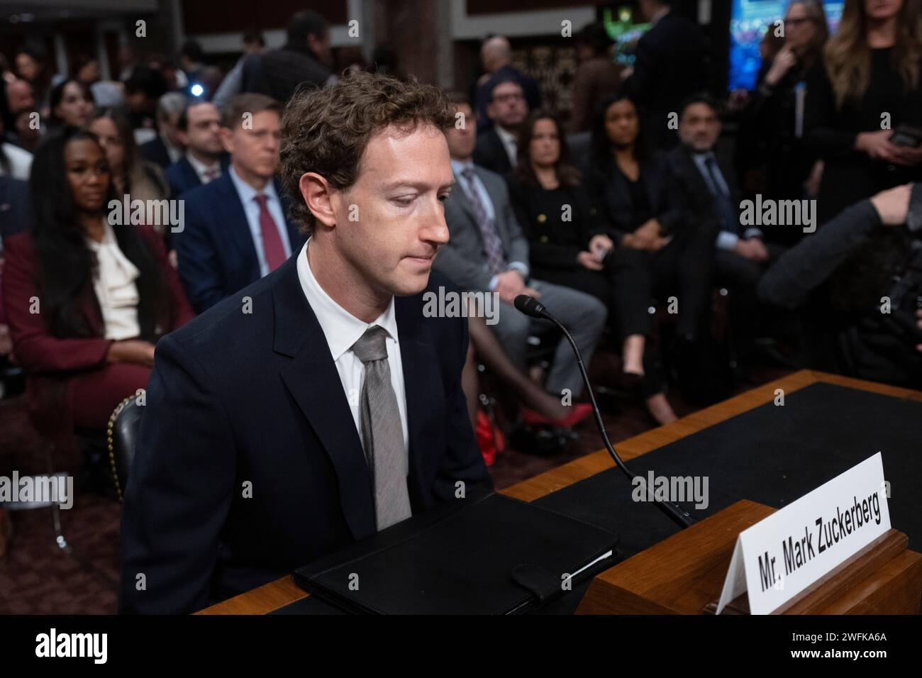 Meta CEO Mark Zuckerberg, is seated as he arrives to testify during the ...