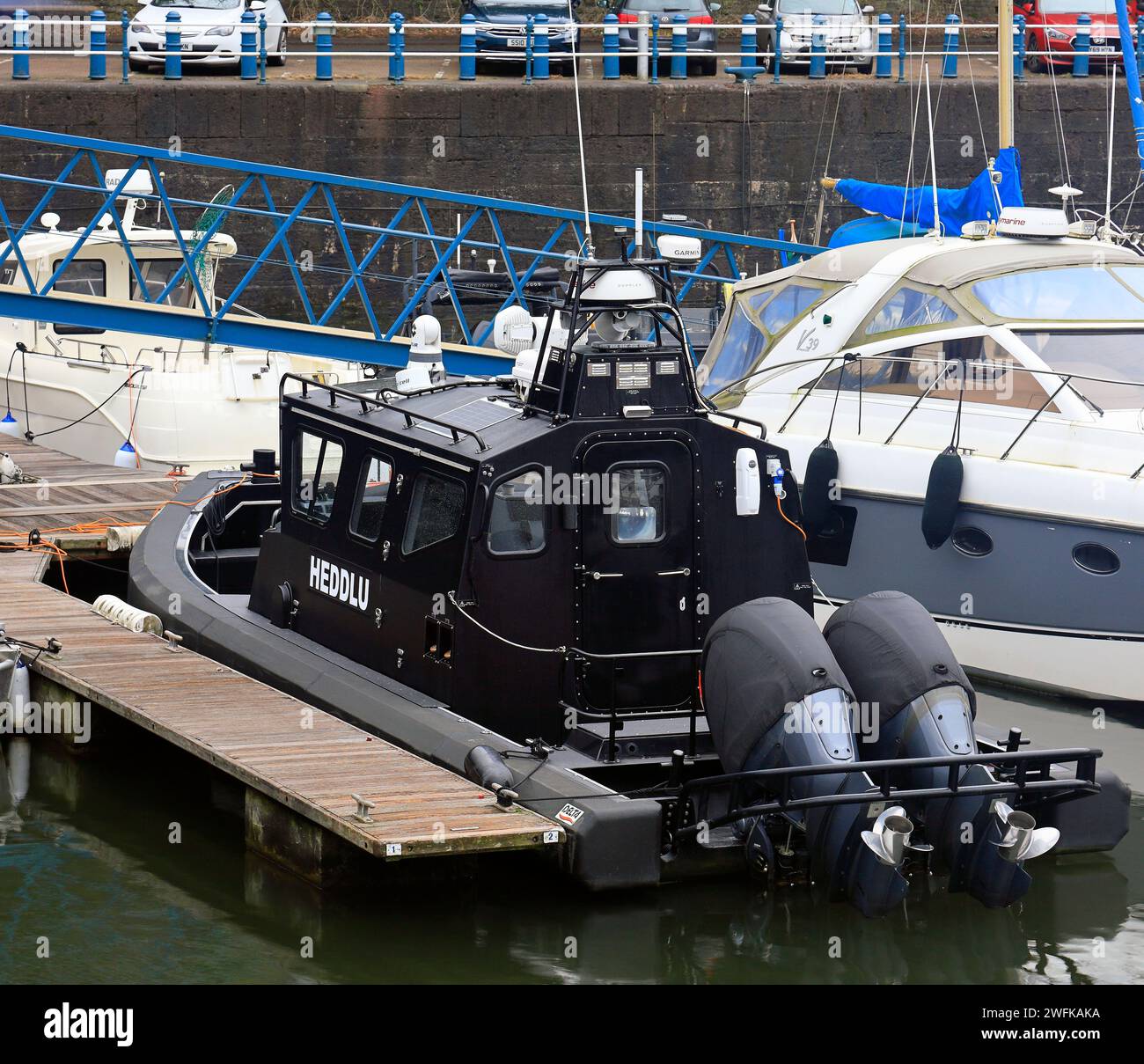Black fast boat marked in welsh - Heddlu - (Police) , moored at Penarth ...