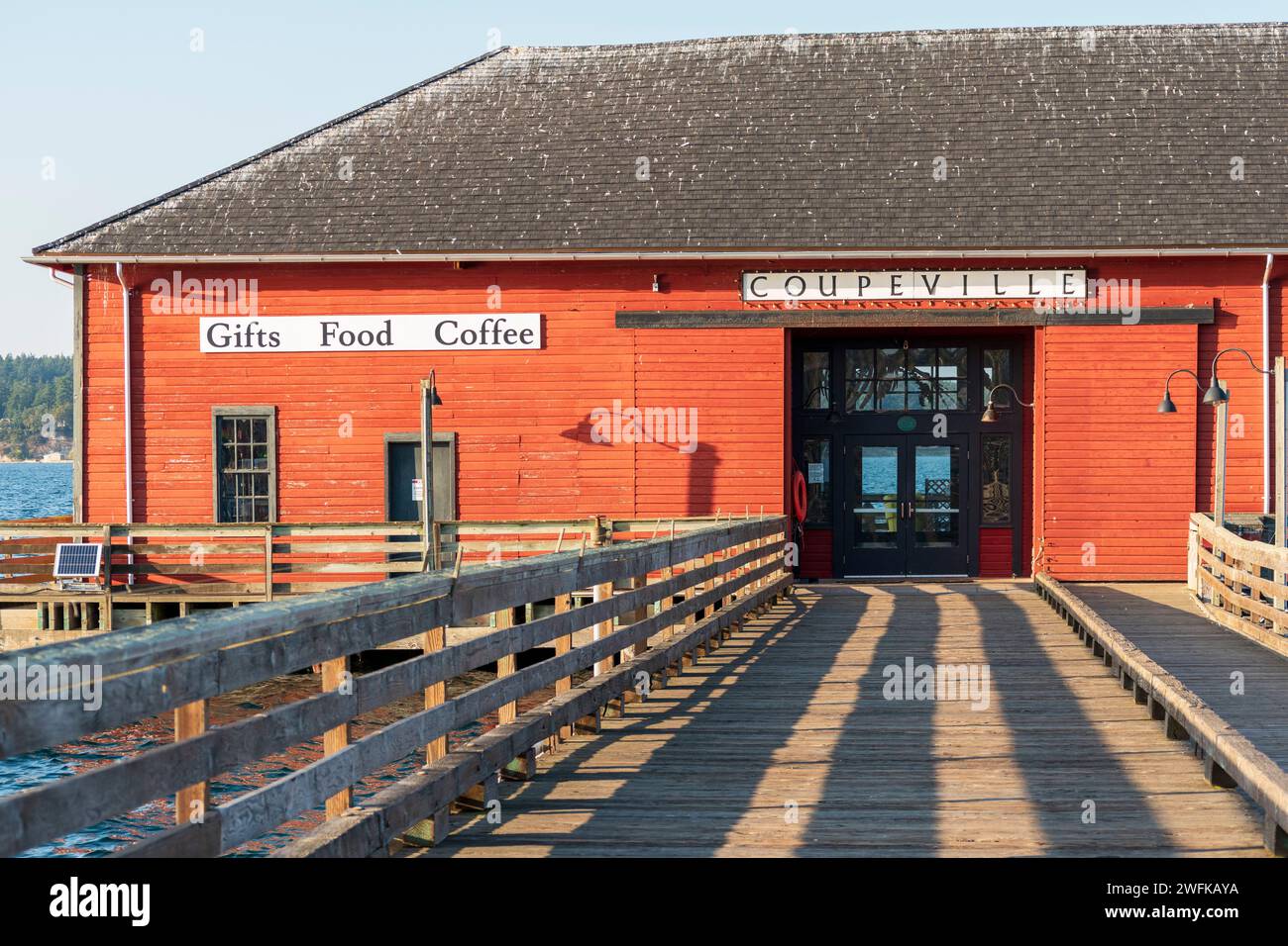 Horizontal photo of the historic red building at the end of a pier in ...
