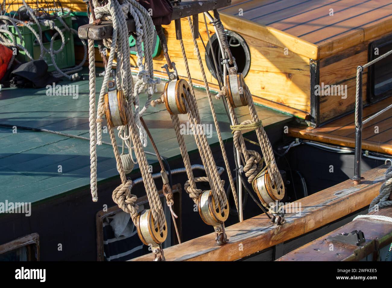 Wooden blocks with ropes on an old varnished sailing ship Stock Photo ...