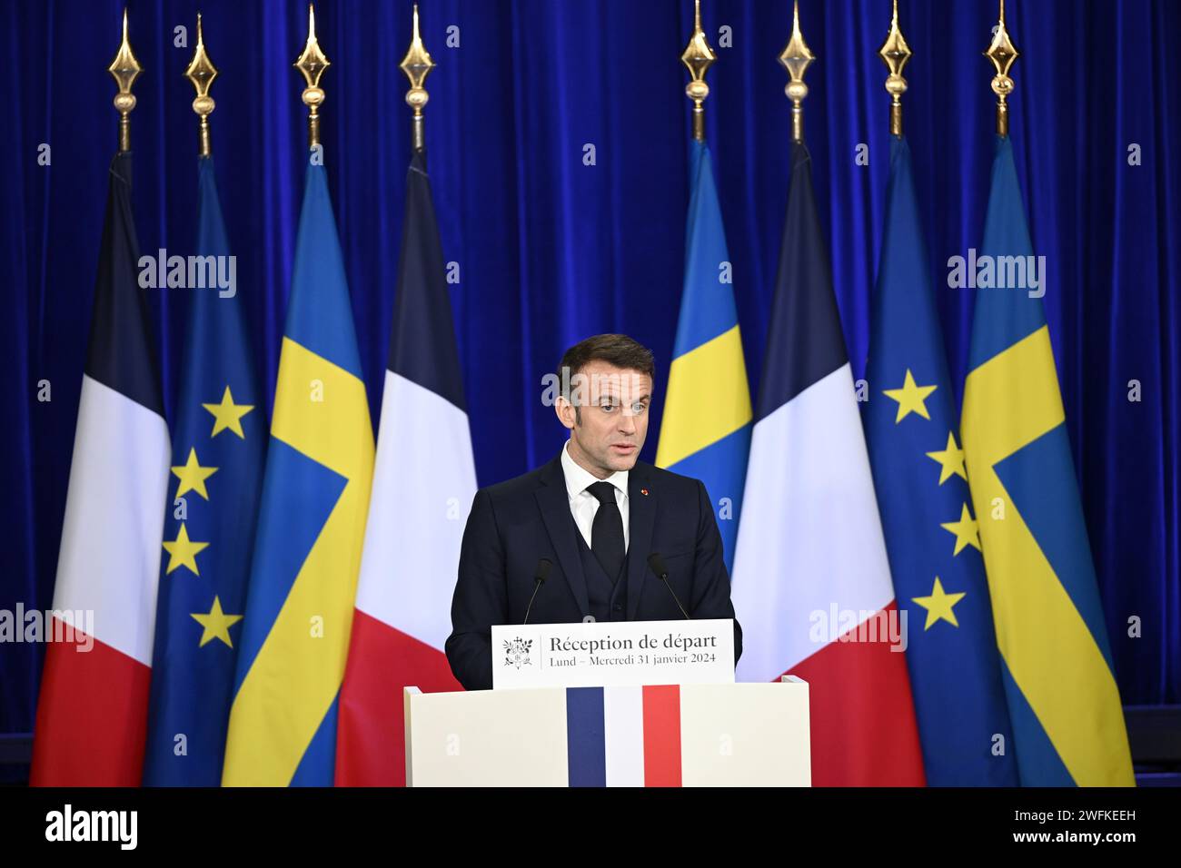 French President Emmanuel Macron speaks during a reception hosted by ...