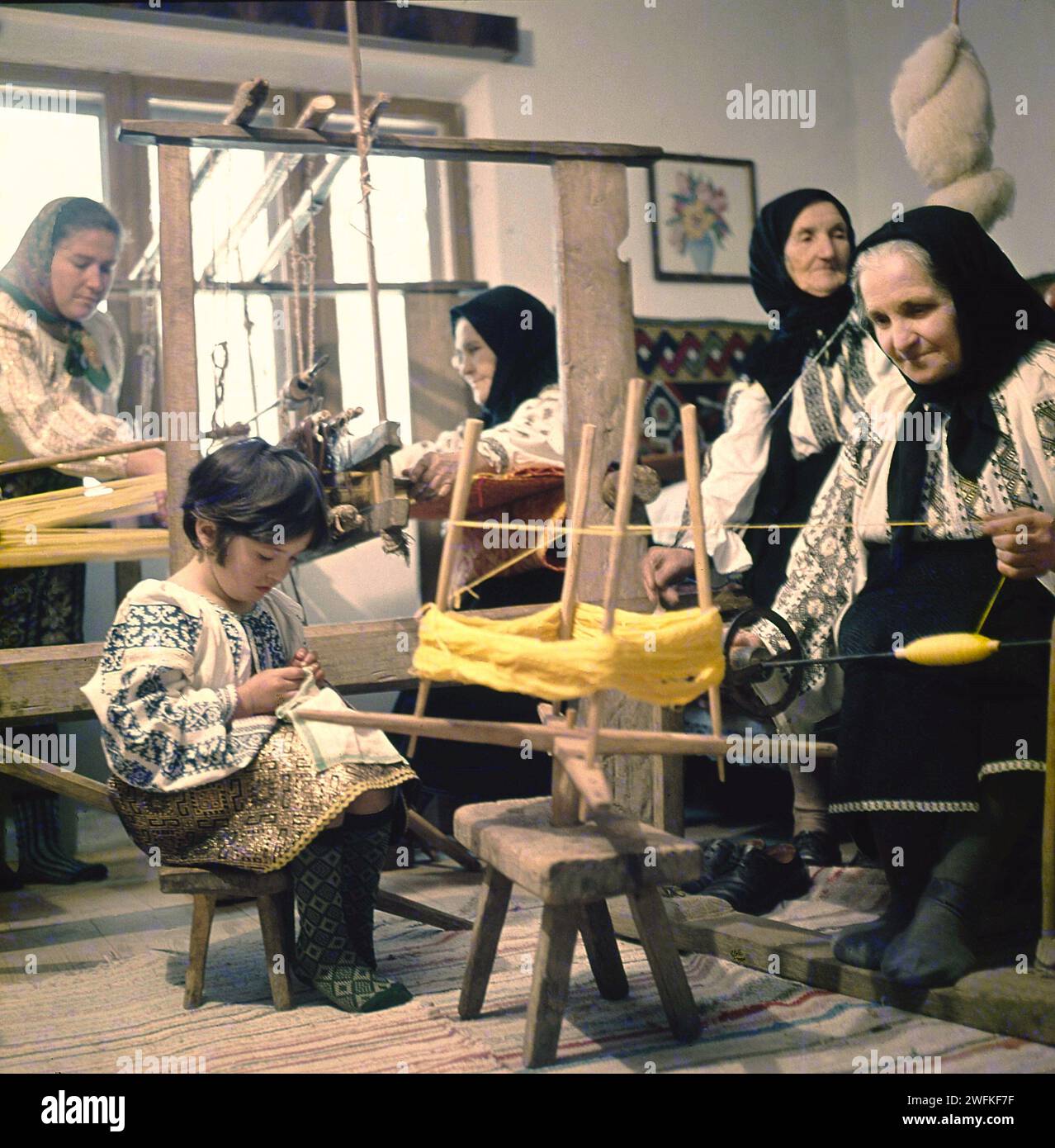 Vrancea County, Romania, approx. 1978. Group of women wearing beautiful ...