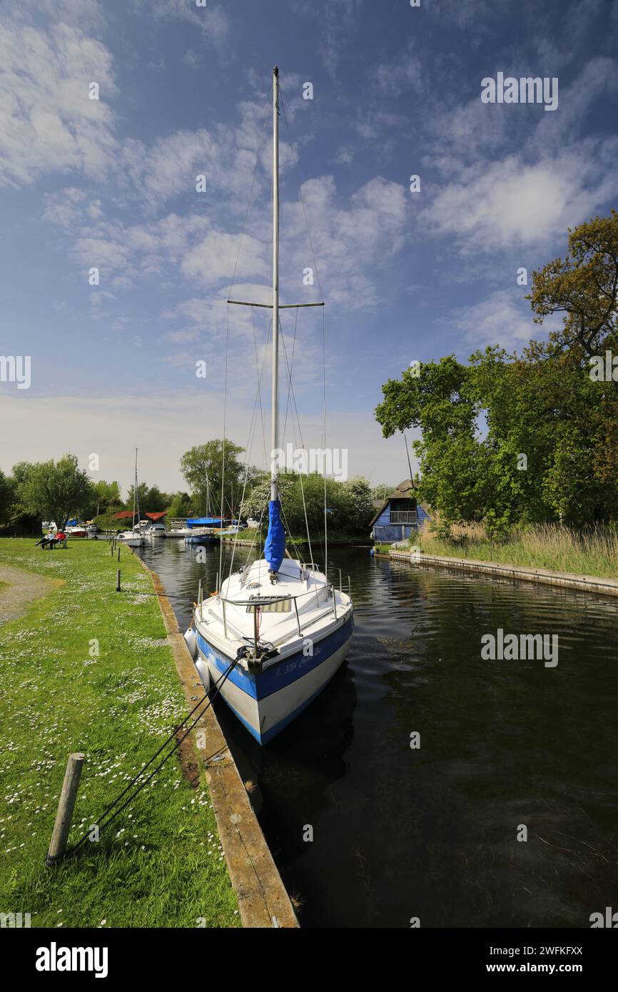 Summer view over boats at Hickling Broad, Norfolk Broads National Park ...
