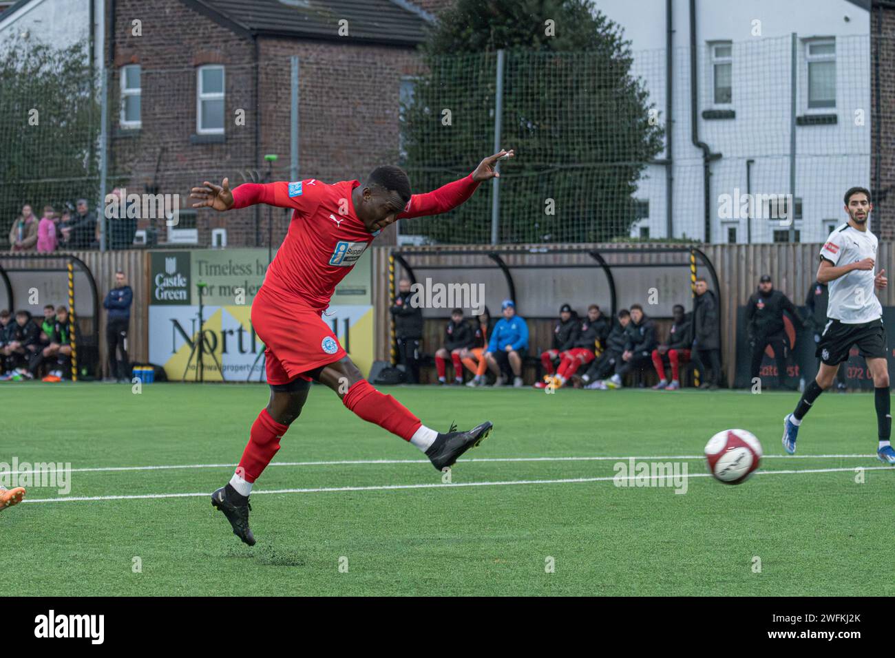 Adama Sidibeh, playing as striker for Warrington Rylands Stock Photo ...