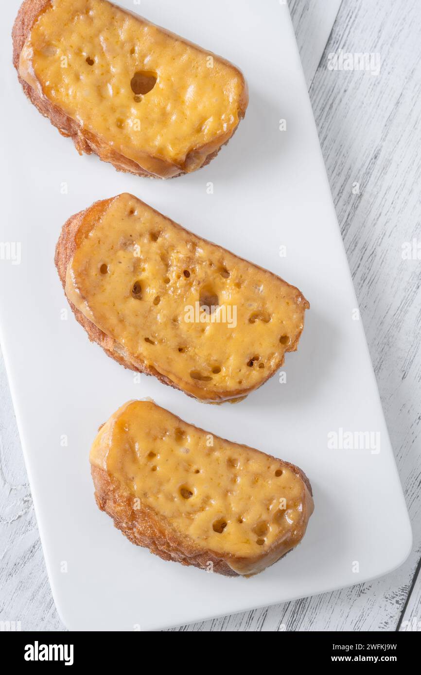 Portion of cheddar cheese toasted ciabatta bread Stock Photo - Alamy