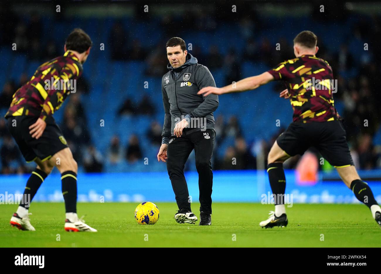 Burnley first team coach Mike Jackson (centre) before the Premier ...