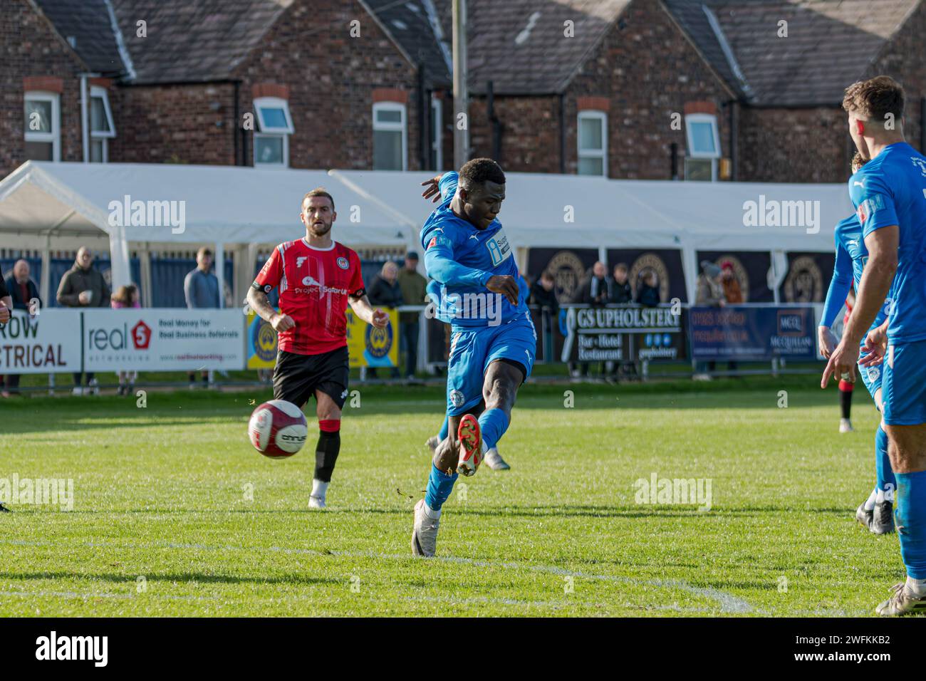 Adama Sidibeh, playing as striker for Warrington Rylands Stock Photo ...