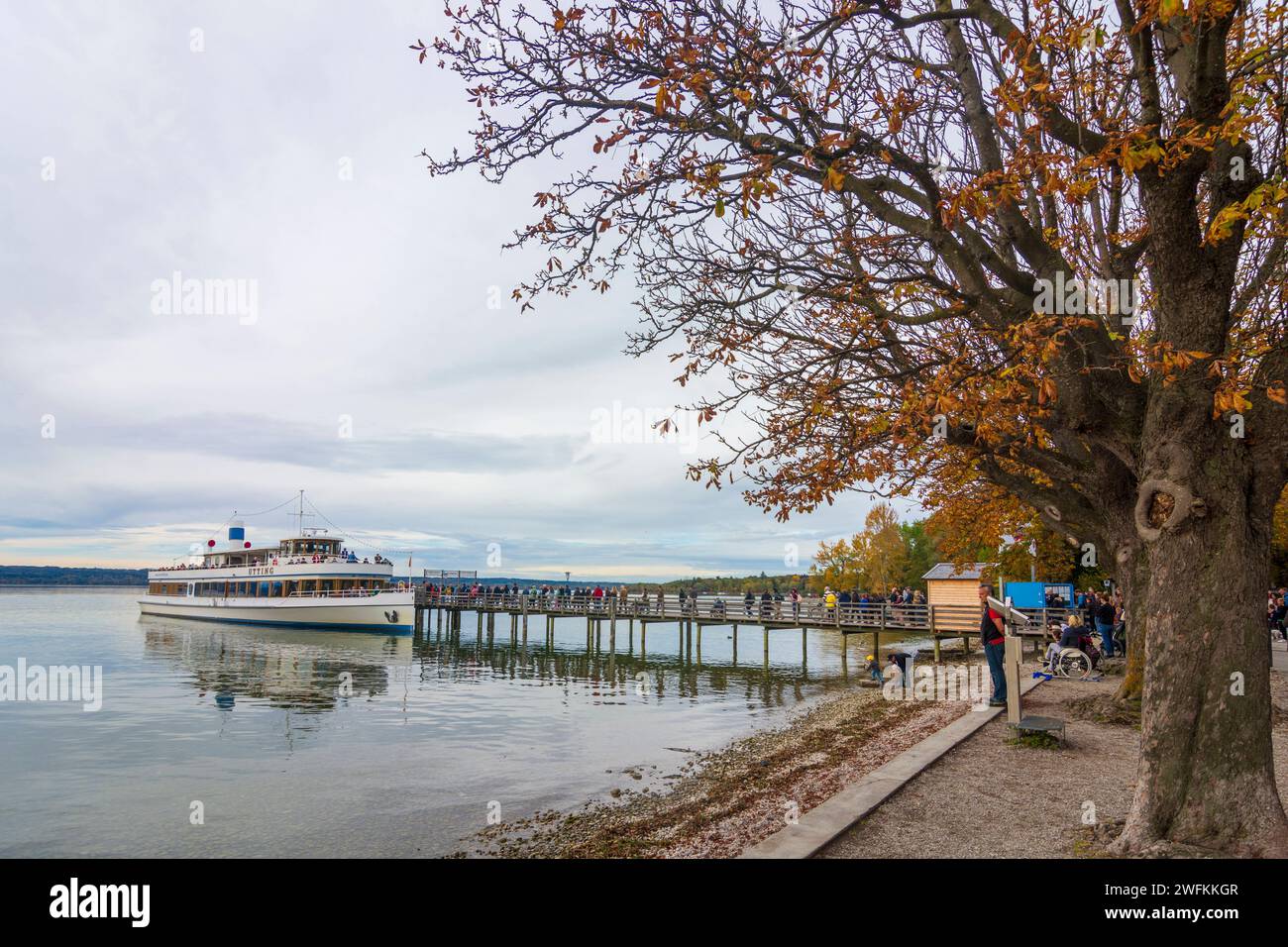lake Ammersee, jetty, passenger ship, autumn colors Stock Photo - Alamy