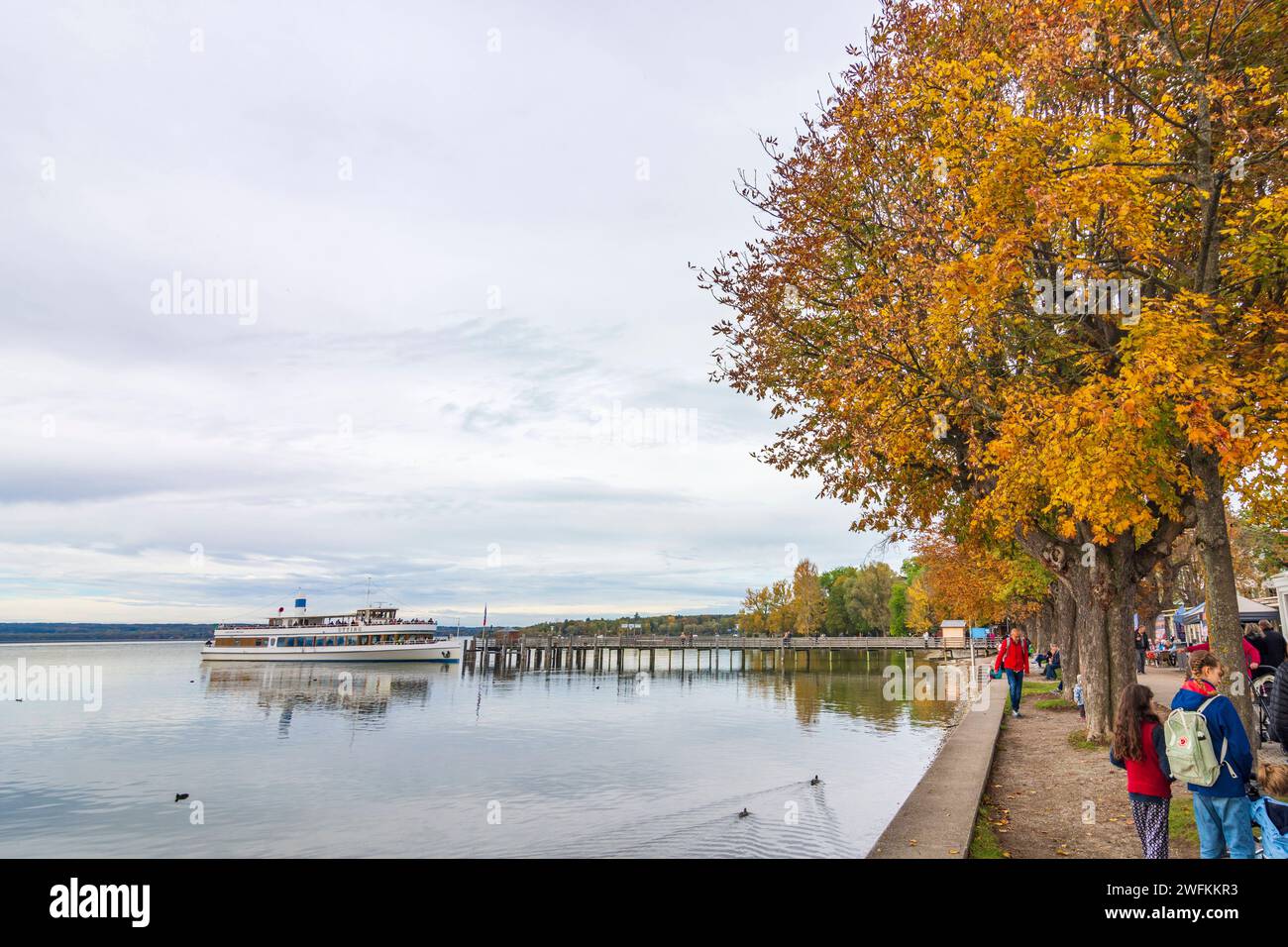 lake Ammersee, jetty, passenger ship, autumn colors Stock Photo - Alamy