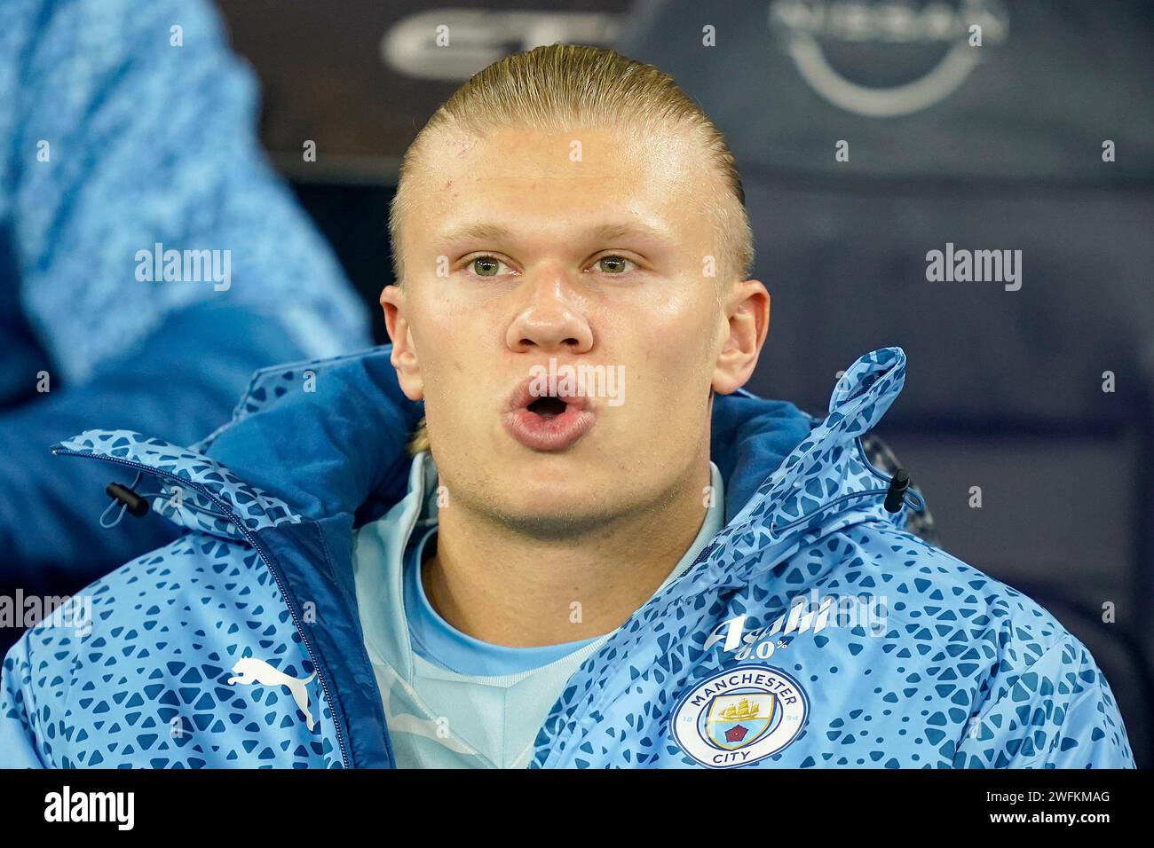 Manchester City's Erling Haaland sits on the bench during the English ...