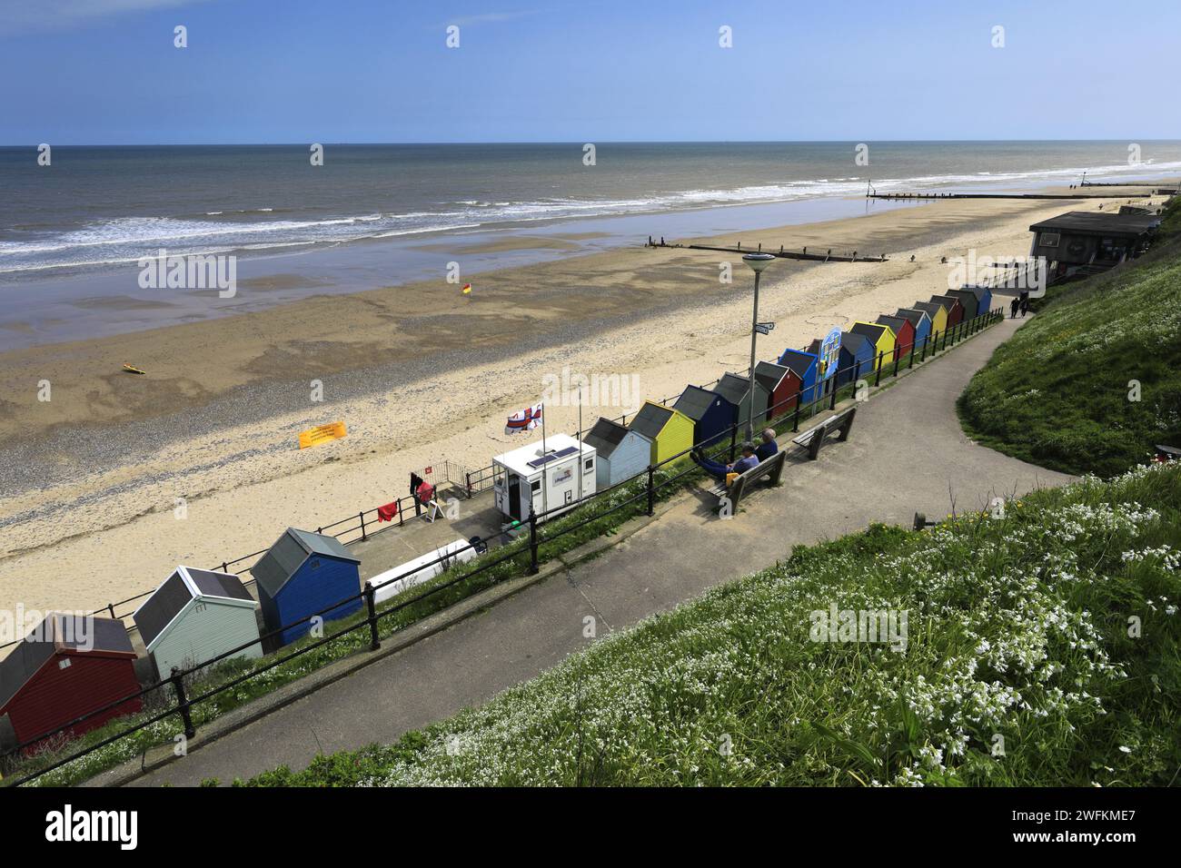 Beach huts and the beach at Mundesley village, North Norfolk, England ...