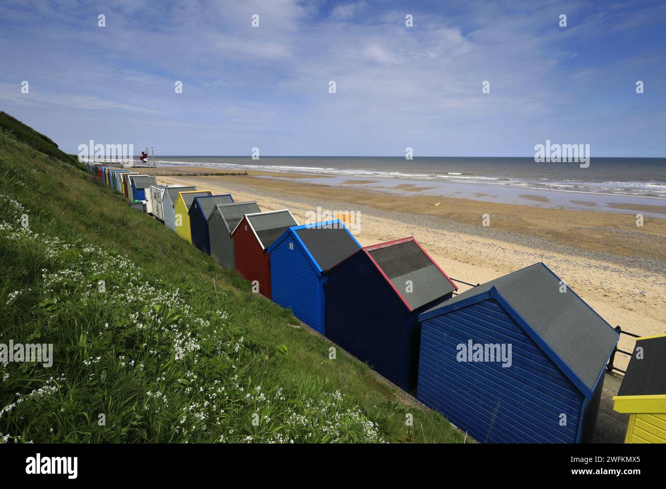 Beach huts and the beach at Mundesley village, North Norfolk, England ...