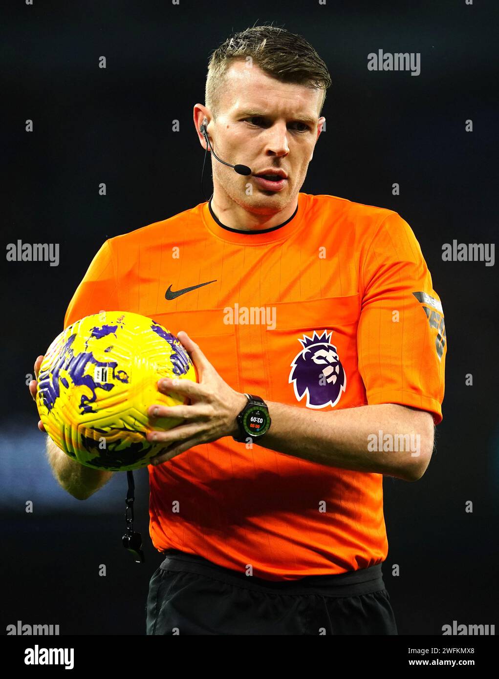 Referee Sam Barrott with the match ball during a stop in play in the ...