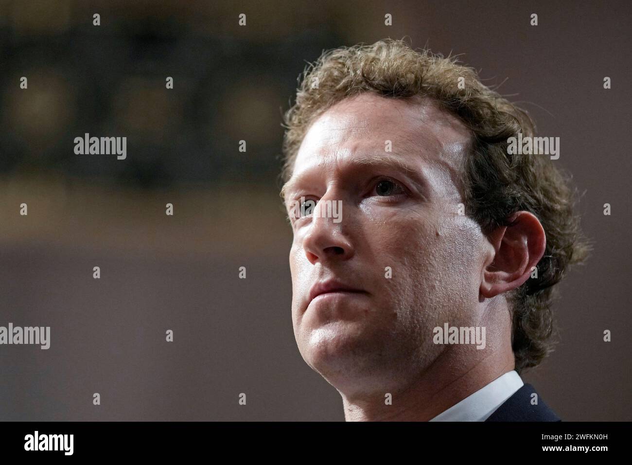 Meta CEO Mark Zuckerberg listens during a Senate Judiciary Committee ...