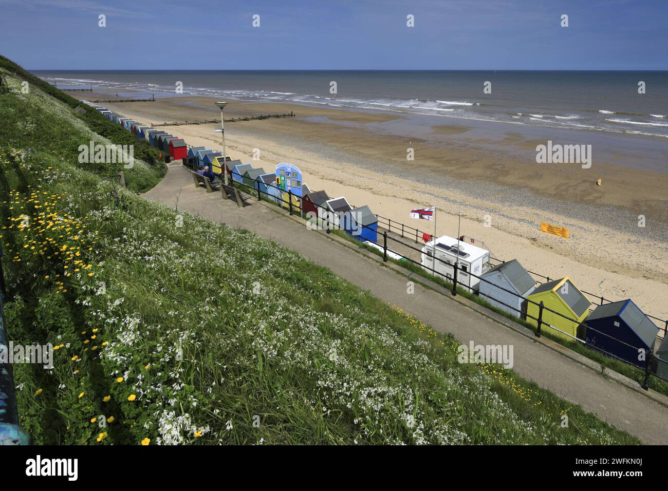 Beach huts and the beach at Mundesley village, North Norfolk, England ...