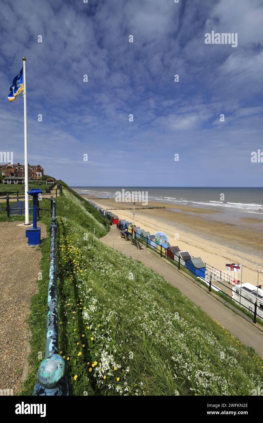 Beach huts and the beach at Mundesley village, North Norfolk, England ...