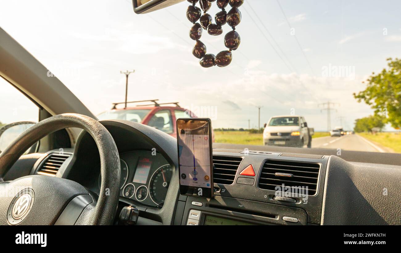 Waze maps showing the way thru the city. Driver using Waze maps Stock ...