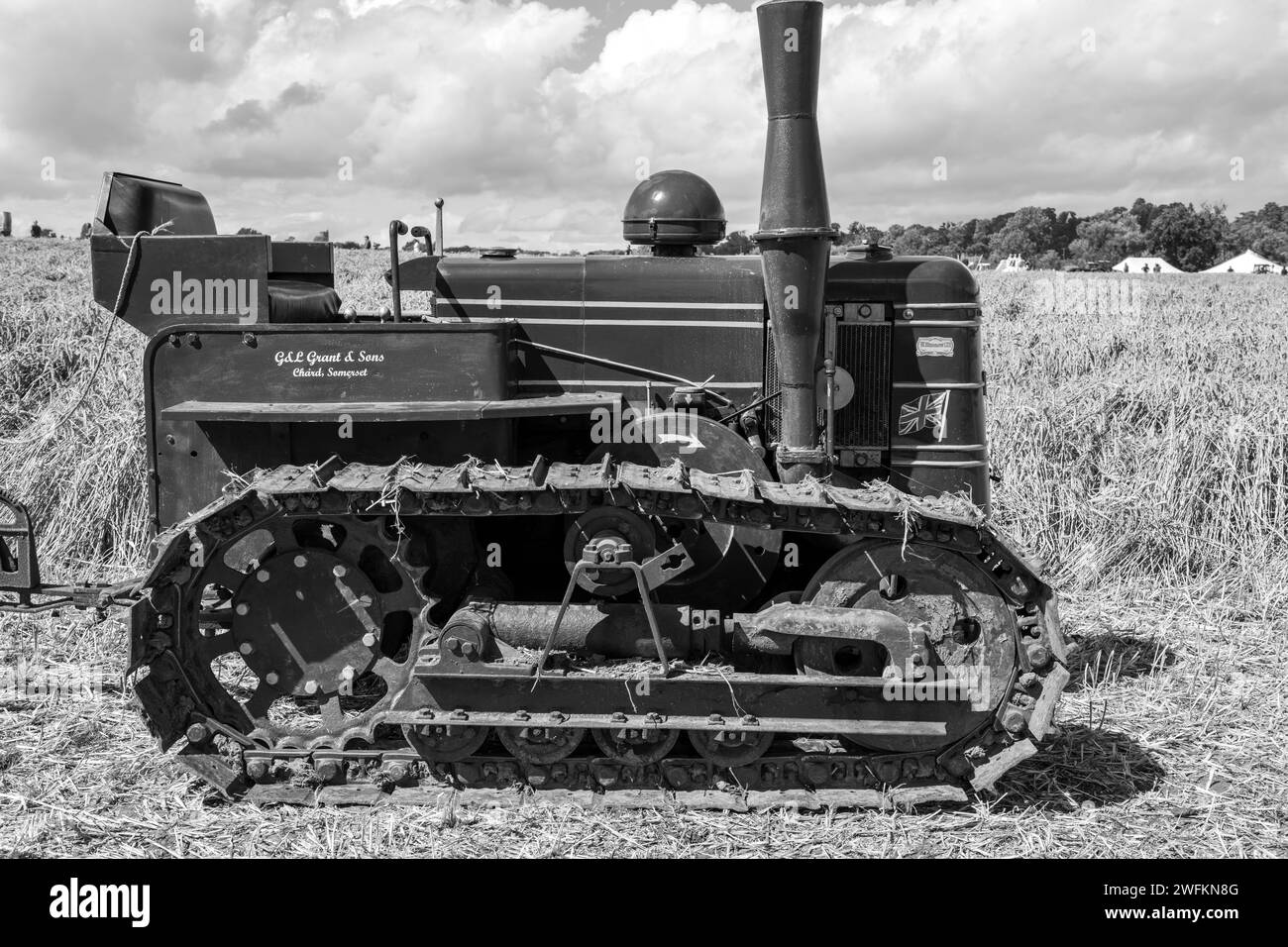 Side view of tractor with plough hi-res stock photography and images ...