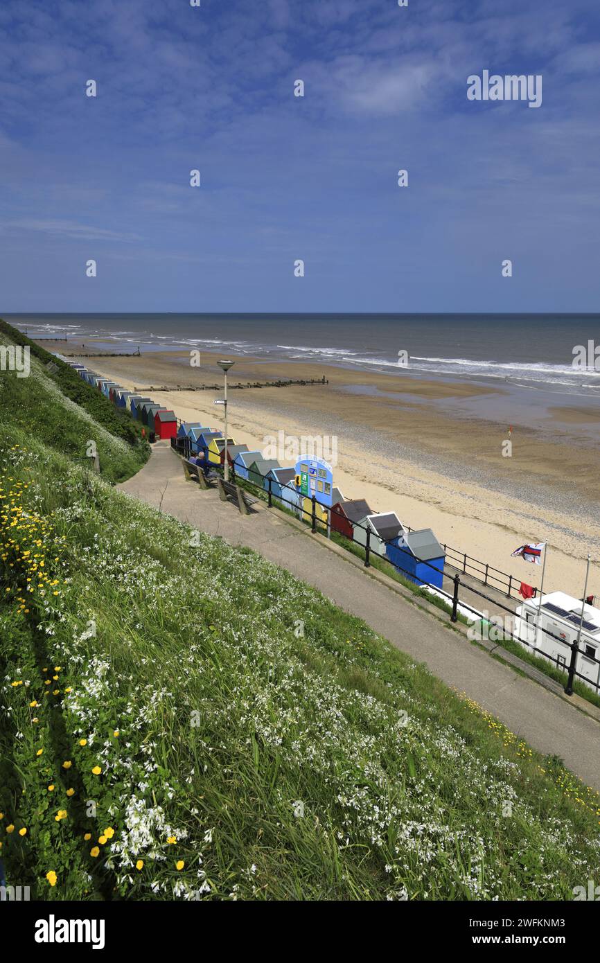 Beach huts and the beach at Mundesley village, North Norfolk, England ...