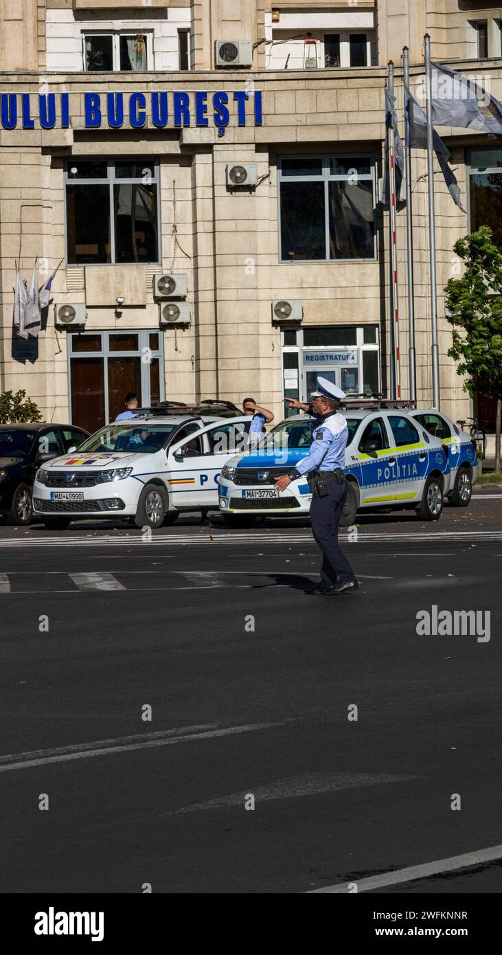 Police agent, Romanian Traffic Police (Politia Rutiera) directing ...