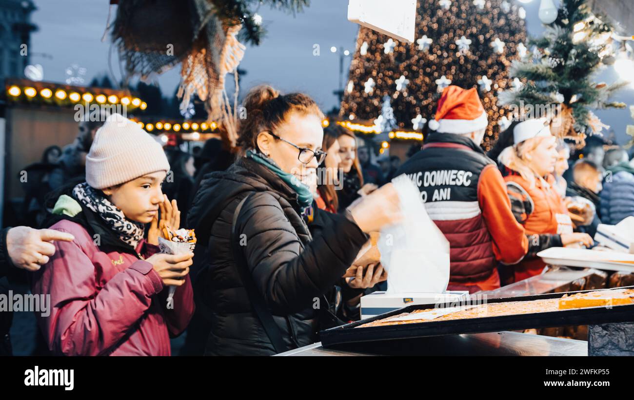 People at Bucharest Christmas Market during winter holiday Stock Photo ...