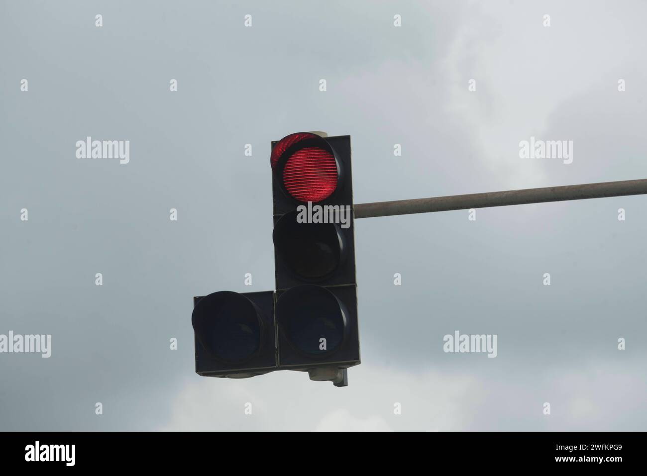 red traffic light signal on the street, symbol for stopping red traffic ...