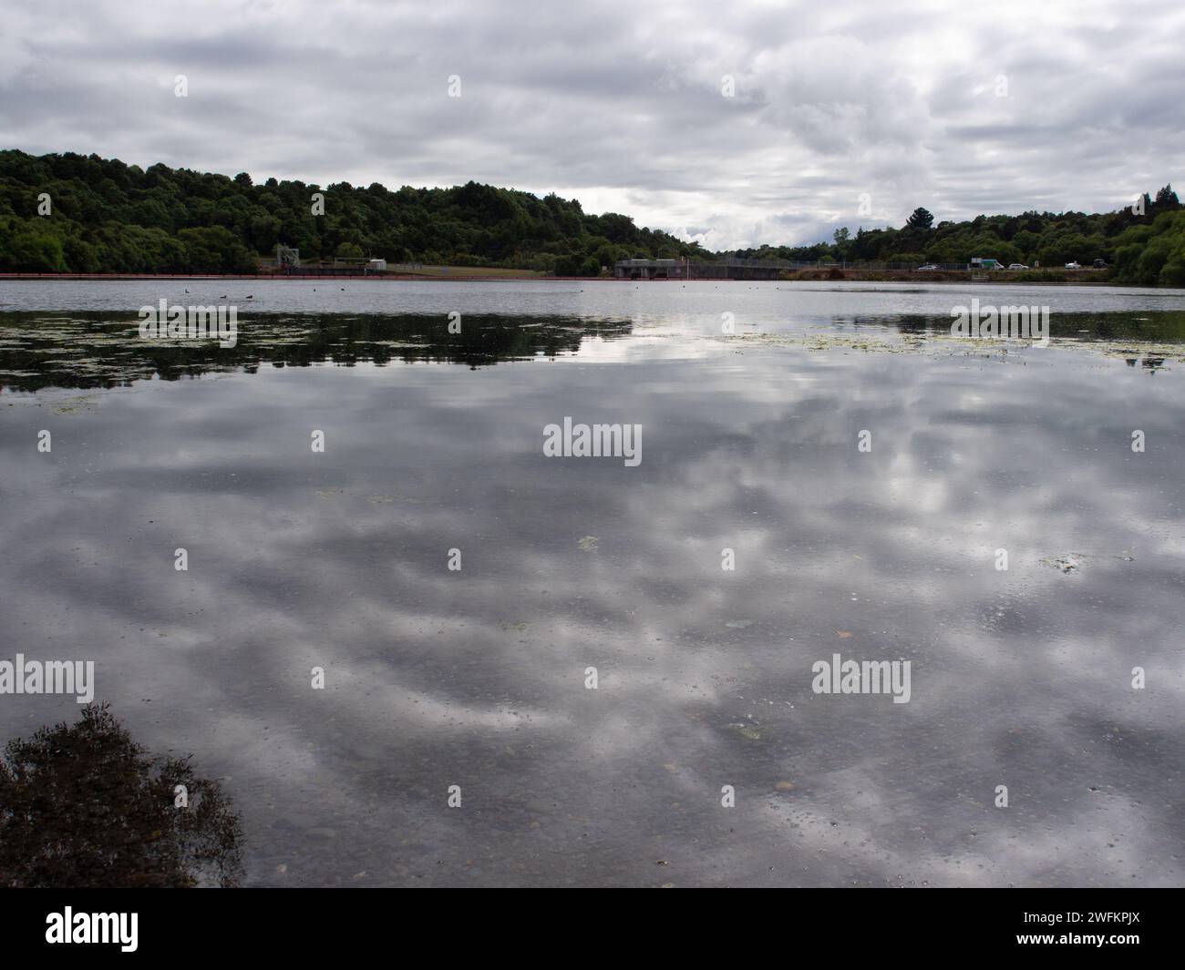 Reflections Across Lake Water Surface On An Overcast Day Stock Photo ...