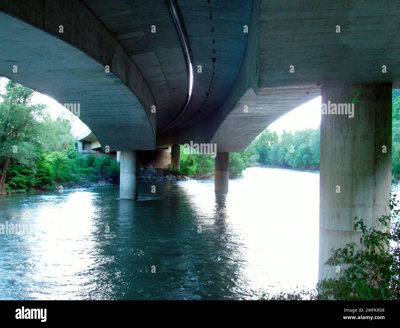 a concrete girder bridge as a structure that crosses natural obstacles ...