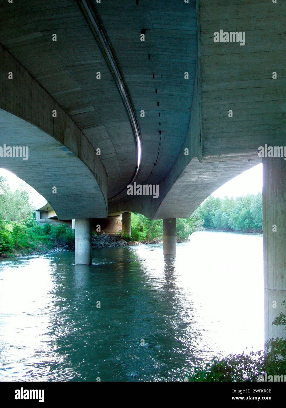 a concrete girder bridge as a structure that crosses natural obstacles ...