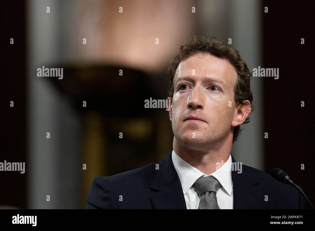 Meta CEO Mark Zuckerberg listens during a Senate Judiciary Committee ...